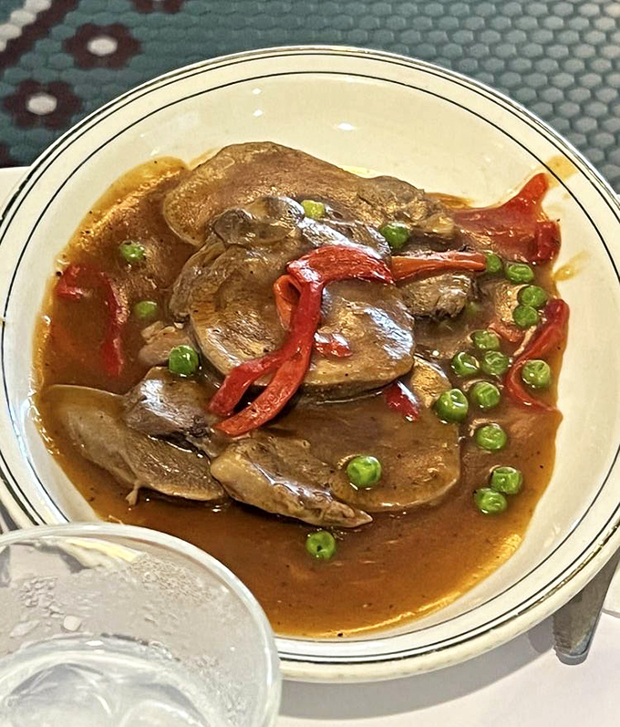 Lengua that'll convert even the skeptics, swimming in a sauce worth writing home about.