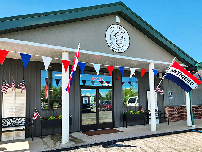 The Lewisburg Antique Mall beckons with patriotic flair, promising treasures inside that Instagram filters simply cannot replicate.