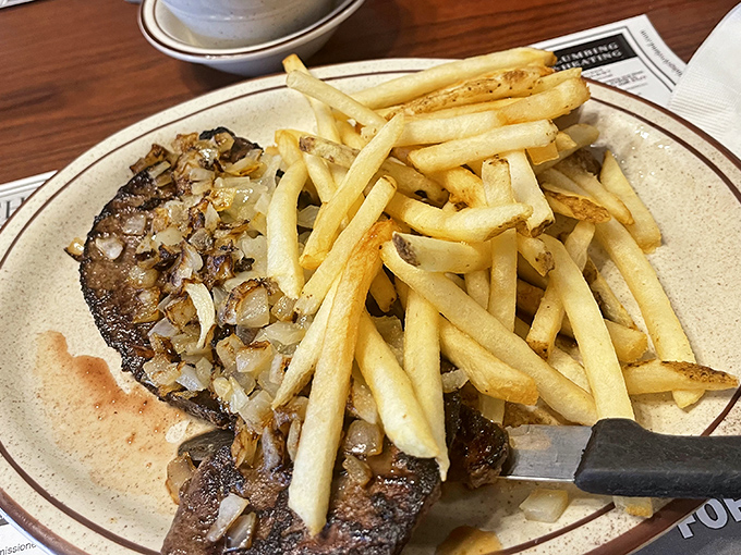 Liver and onions with a mountain of fries&mdash;a dish that separates casual diners from true comfort food aficionados. Your grandfather would approve.