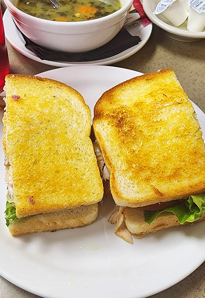 Even a simple sandwich becomes extraordinary at Slyman's. This toasted creation demonstrates their commitment to excellence extends beyond their famous corned beef.