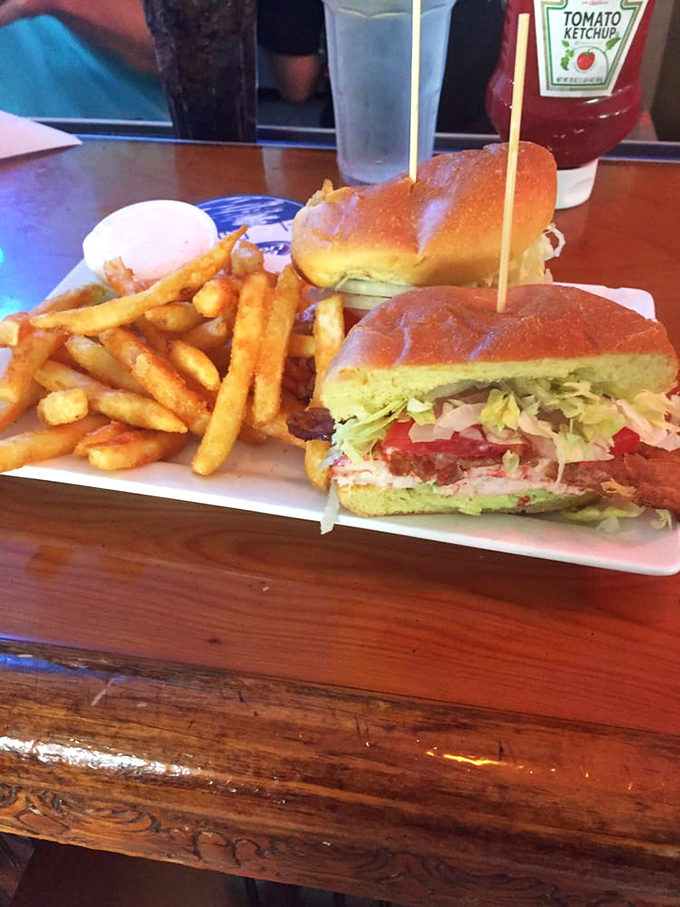 These lobster club sandwiches weren&rsquo;t just a meal&mdash;they were handheld happiness, served in hearty halves alongside crispy fries that made you forget all about your diet plans.