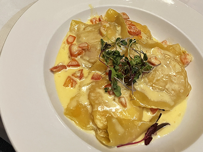 These lobster ravioli aren't just dinner; they're little pillows of happiness floating in a sauce that deserves its own fan club.