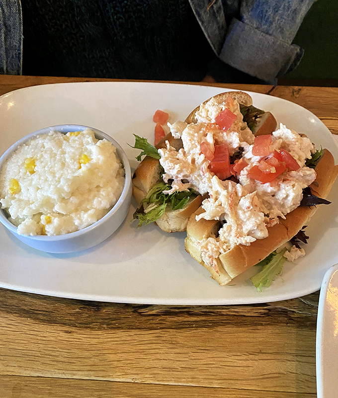 A seafood sandwich that would make coastal towns jealous, paired with creamy grits that could convert even the most stubborn Northerner.