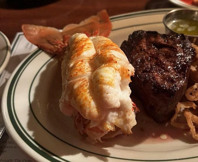Land and sea in perfect harmony &ndash; a lobster tail that practically glows alongside a steak that refuses to be upstaged.