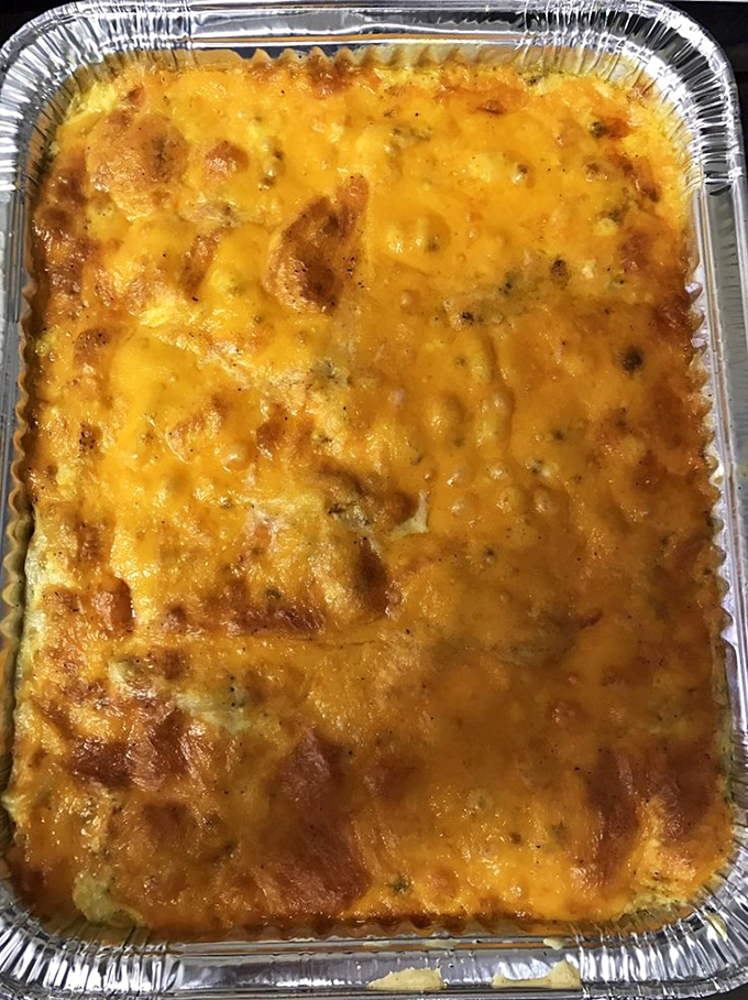 This mac and cheese isn't just comfort food &ndash; it's therapy in a foil pan with a golden, bubbling crust.