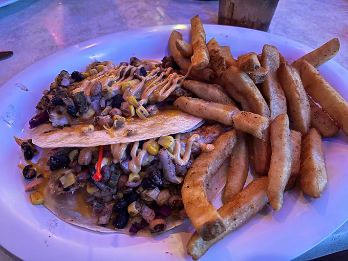 These mahi tacos don't just satisfy hunger; they solve existential crises. One bite and suddenly life's problems seem deliciously manageable.