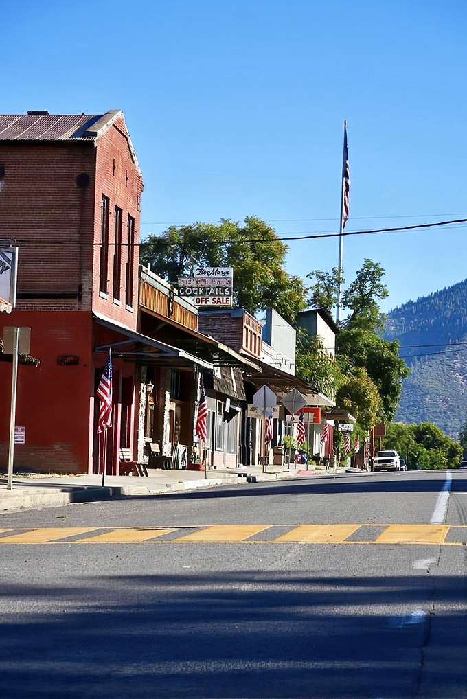 American flags line Main Street like loyal sentinels. Against the backdrop of mountain vistas, small-town patriotism never looked so picturesque.