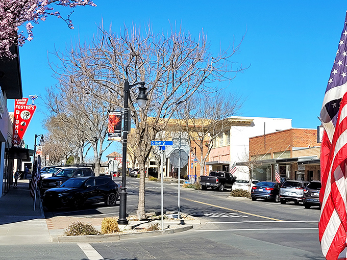 American flags and leafy trees line Main Street &ndash; Norman Rockwell would've added this scene to his portfolio if he'd ventured west of the Mississippi.