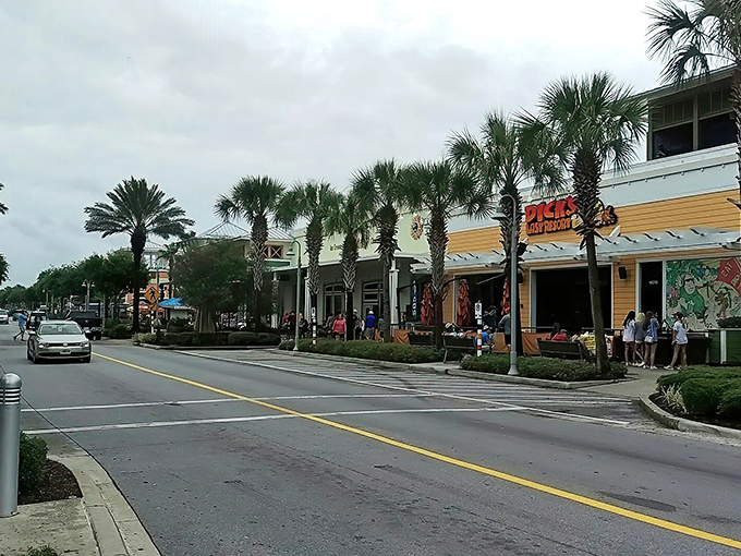 Palm-lined streets create nature's own colonnade, leading shoppers through a retail paradise that somehow feels more relaxing than your average mall expedition.