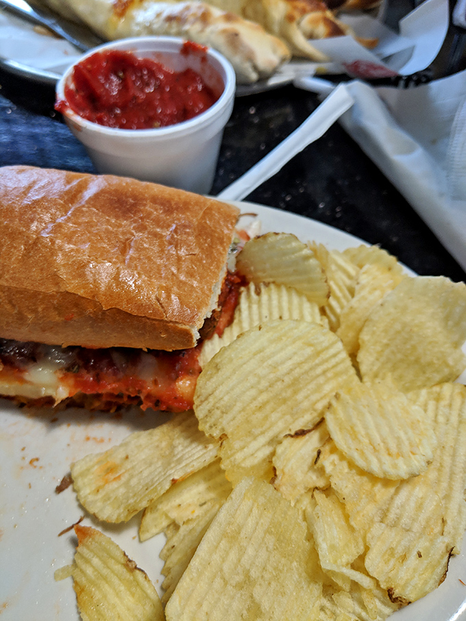 Sandwich architecture at its finest. This sub with chips isn't just lunch&mdash;it's structural integrity meeting flavor engineering in perfect harmony.