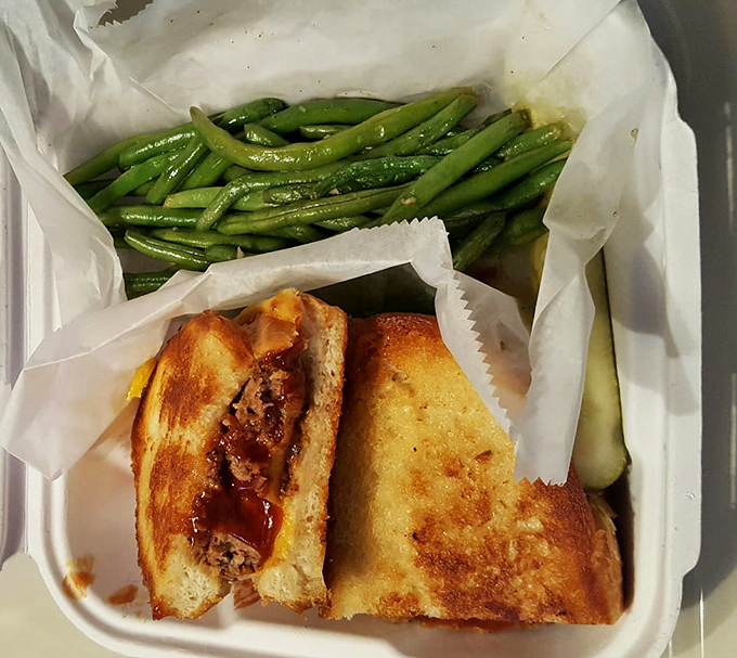 A grilled meatloaf sandwich that would make your grandmother simultaneously proud and jealous. Comfort food that hugs your soul from the inside.