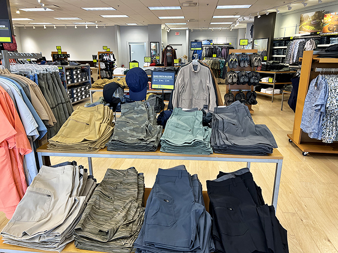 Men's casual wear displayed with military precision, where finding your size in that perfect shade of khaki feels like winning a small but significant lottery.