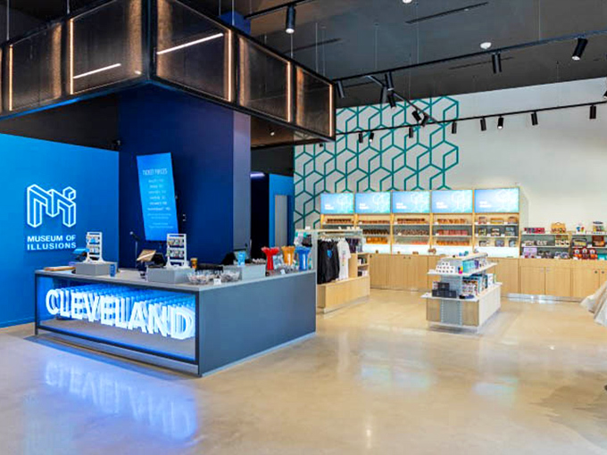 The sleek reception area and gift shop prove that even the business end of wonderland can be stylishly disorienting.