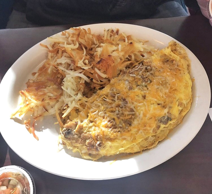 This omelet doesn't just contain cheese&mdash;it embraces it with the enthusiasm of a long-lost relative at a family reunion.