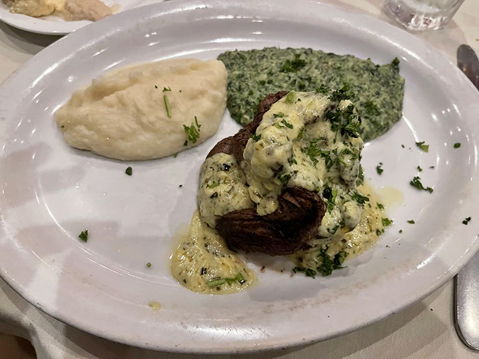 Filet mignon draped in b&eacute;arnaise sauce with a side of creamed spinach &ndash; proof that sometimes the classics endure because they're simply unimprovable.