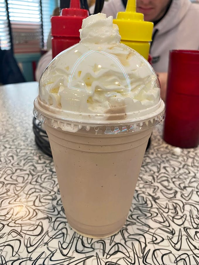 A milkshake so thick it laughs at straws. This isn't a drink&mdash;it's a commitment, a lifestyle choice, a creamy mountain of happiness.