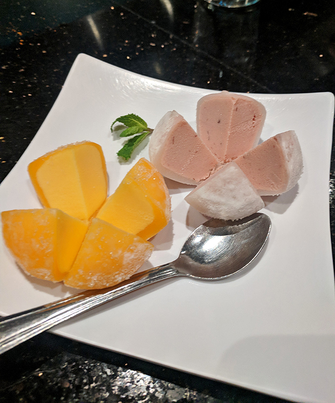 The sweet finale: mochi ice cream and mango sherbet. Like getting a cool hug after a warm meal.