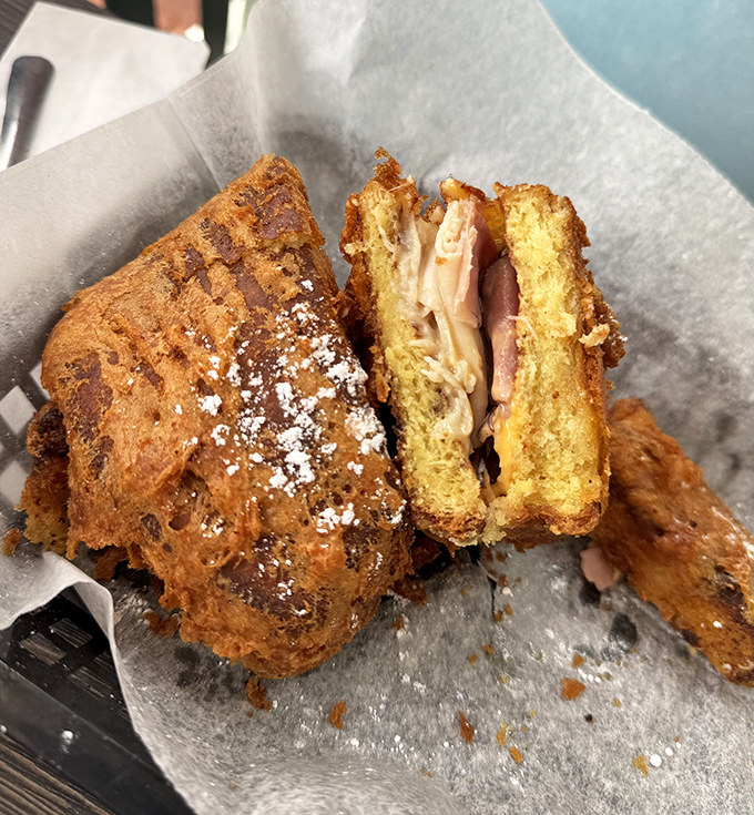 The Monte Cristo sandwich – French toast meets ham and cheese in what can only be described as breakfast's answer to formal evening wear.