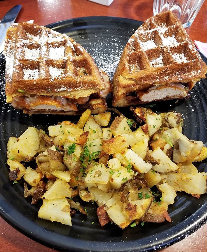 The Montecristo waffle sandwich: where French toast meets grilled cheese in beautiful, crispy harmony.