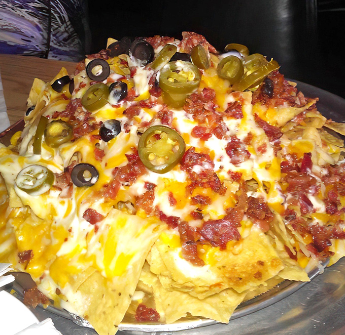 Nachos that laugh in the face of minimalism&mdash;a mountain of chips, cheese, jalape&ntilde;os, and bacon that requires strategy and commitment to conquer.