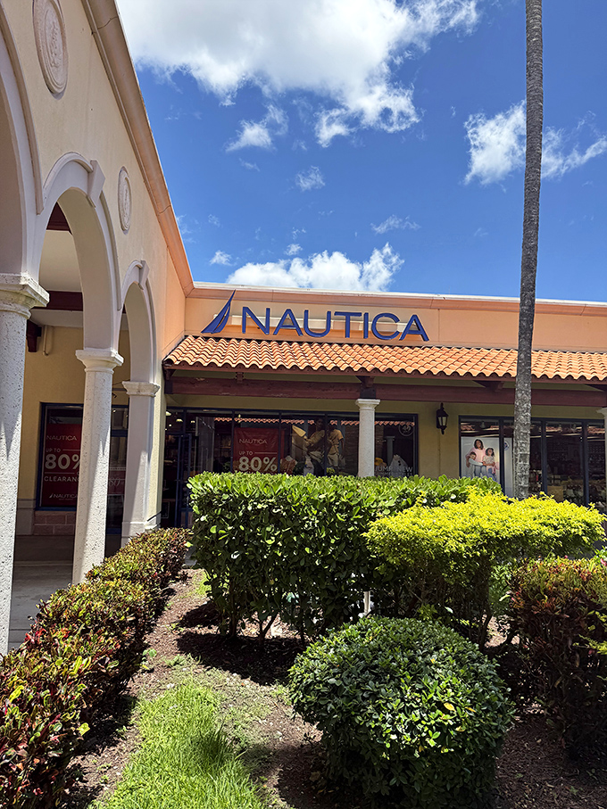 Nautica's storefront practically screams "Buy these clothes and pretend you own a yacht!" with discounts deep enough to make you feel like you've discovered buried treasure.