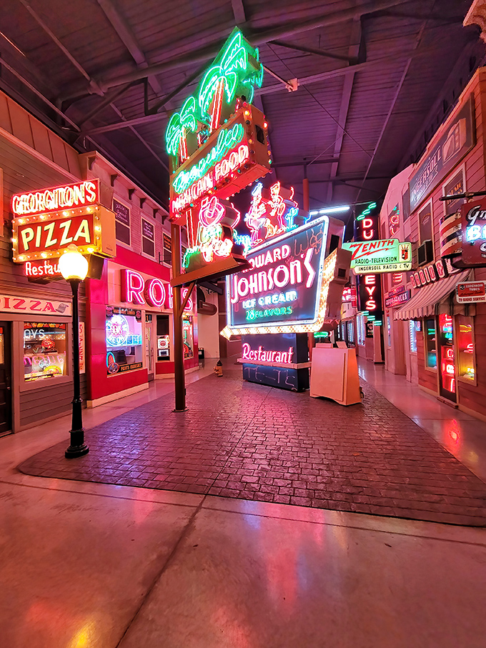 A dazzling corridor of commercial art history. Each sign tells stories of road trips, family vacations, and midnight diners across America.
