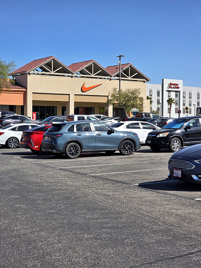 The iconic swoosh of Nike stands ready for desert shoppers seeking athletic wear that performs better than their New Year's resolutions.