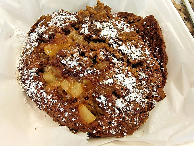 Apple cinnamon pancakes dusted with powdered sugar &ndash; autumn's greatest hits album served on a plate year-round.