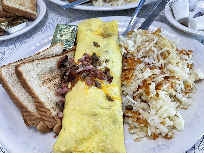 That omelet could feed a small family, folded over ham and cheese with hash browns crisped to perfection&mdash;breakfast doesn't get more beautiful than this.