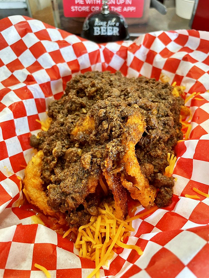 Not just chili-topped fries but a archaeological dig where each layer&mdash;crispy potatoes, savory chili, melted cheese&mdash;reveals new treasures with every bite.