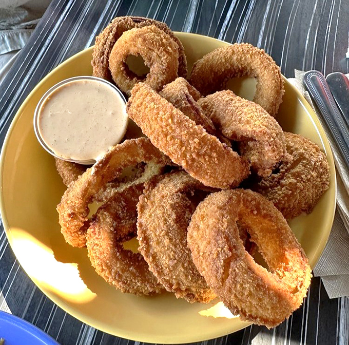 These onion rings aren't just side characters &ndash; they're the main event, with a golden crunch that deserves its own standing ovation.