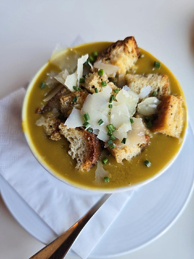 A golden split pea soup crowned with croutons and Parmesan shavings&mdash;comfort food that somehow manages to feel sophisticated.