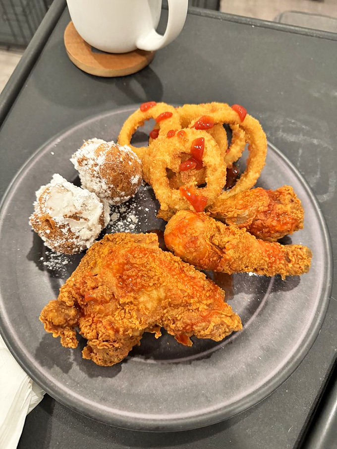 A plate that speaks the universal language of comfort. Those onion rings are wearing their golden formal attire for your dining pleasure.