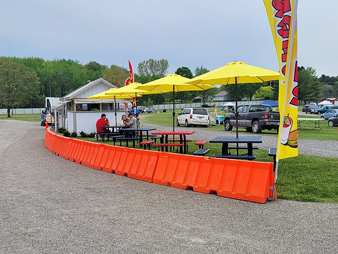 The flea market's dining area offers a moment of respite under cheerful yellow umbrellas&mdash;because treasure hunting requires proper fueling stations.