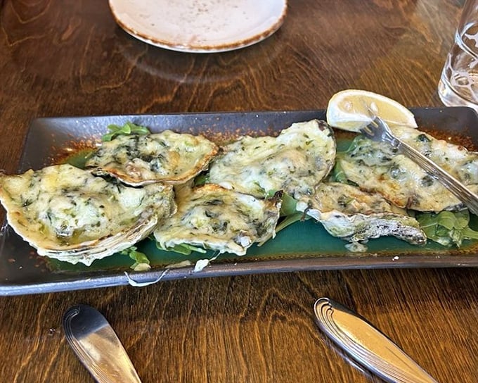 Oysters Rockefeller so decadently topped, they make you understand why the dish was named after America's wealthiest family.