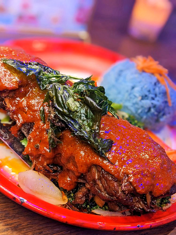 Panang beef that makes you question every other curry you've ever had&mdash;the crispy basil leaves adding textural contrast that elevates the entire experience.