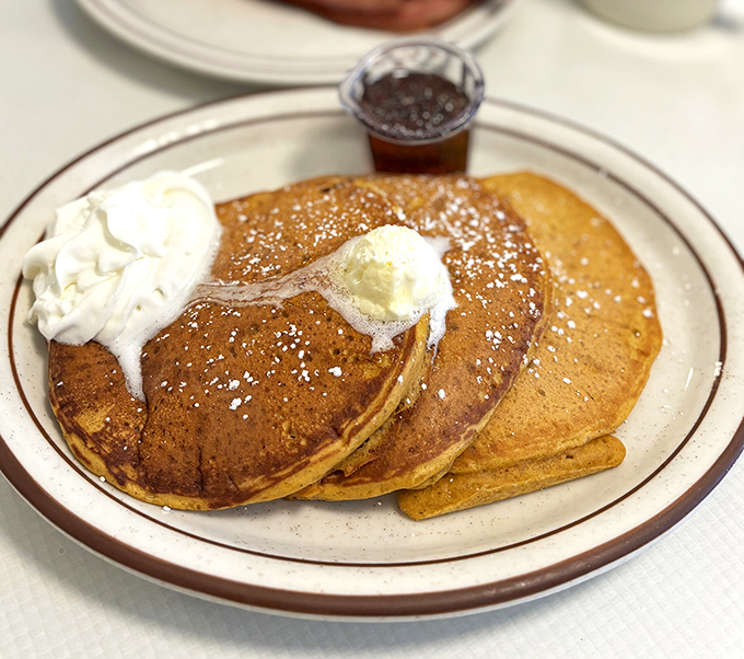 These pancakes aren't just fluffy&mdash;they're what clouds wish they could be when they grow up. That butter pat is melting almost as fast as my heart.
