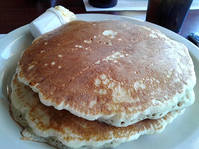Pancakes so fluffy they practically hover above the plate. The golden-brown exterior gives way to a cloud-like interior that's begging for maple syrup.