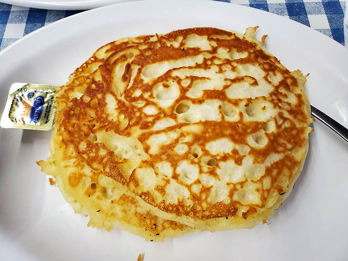 This pancake isn't just golden brown &ndash; it's the kind of perfect disc that makes you wonder if they hired a pancake artist.