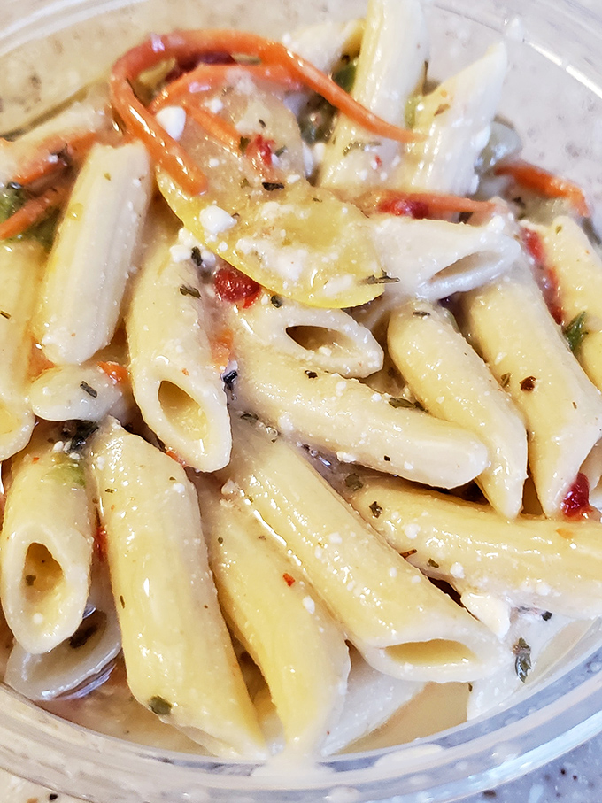 Pasta salad that doesn't know it's from a deli. The kind of side dish that makes you wonder if an Italian grandmother is hiding in the kitchen.