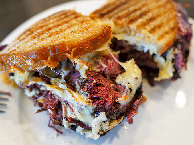 A Reuben cut in half reveals its glorious layers. Like geological strata of deliciousness, each component perfectly balanced with the others.
