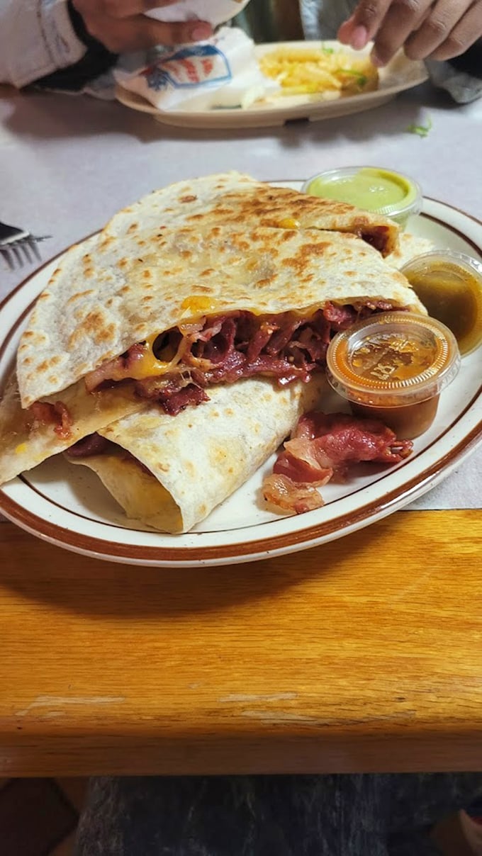 The pastrami quesadilla represents culinary diplomacy at its finest, where Jewish deli meets Mexican tradition in cheesy harmony.