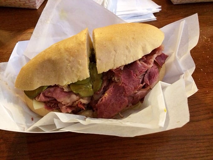 Pastrami so tender it practically surrenders at first bite, nestled in bread that's both cloud and canvas for this meaty masterpiece.