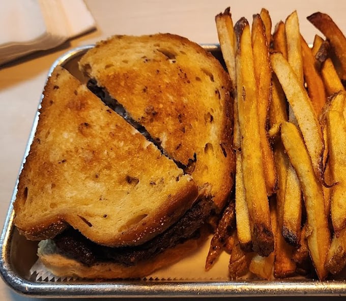 The patty melt&mdash;that brilliant marriage of burger and grilled cheese&mdash;served with fries that deserve their own fan club.