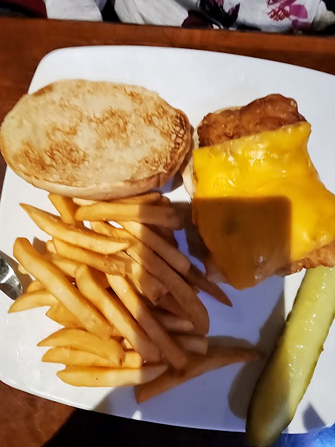 The patty melt that launched a thousand napkins. That melted cheese blanket is what comfort food dreams are made of.