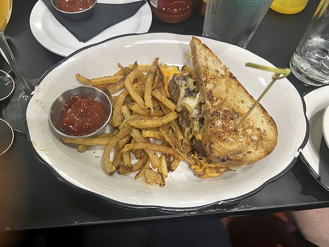 A proper patty melt with crispy fries and house ketchup. Some sandwiches change your life; this one might just save your soul.