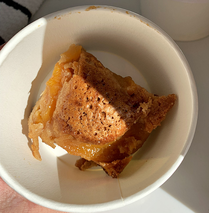 This peach cobbler isn't just dessert &ndash; it's summer sunshine captured in a bowl, with a golden crust that shatters just right under your spoon.