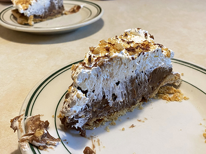 Chocolate cream pie with a mountain of meringue so tall it should have its own zip code. Worth every calorie and then some.