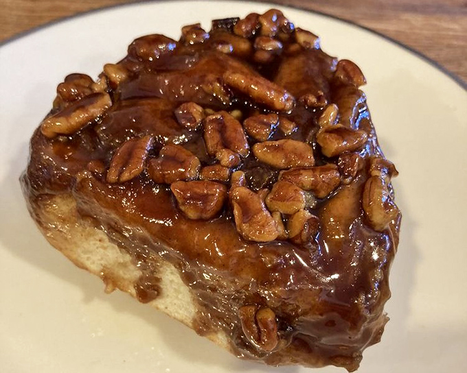 That sticky bun is basically caramelized happiness, glistening like treasure you actually get to eat.
