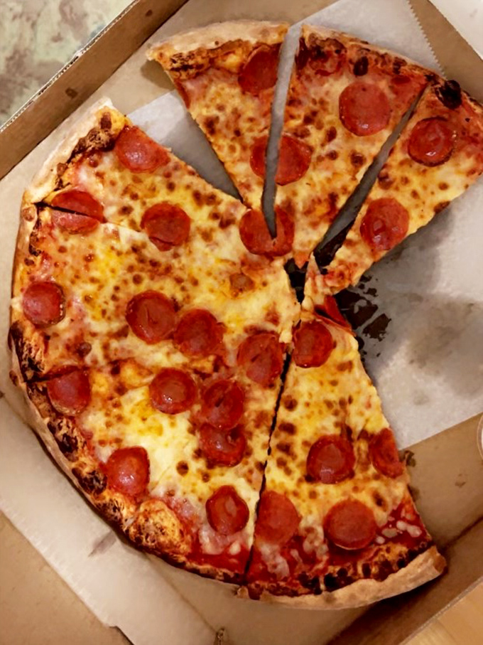 The pepperoni pizza doesn't just have toppings&mdash;it has personality. Each slice boasts the perfect ratio of sauce, cheese, and those crispy-edged pepperoni cups.